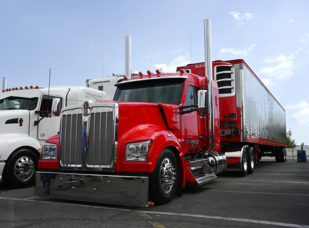 Fire & Finesse: Custom Red Kenworth W990 Roars with Style - Driver First