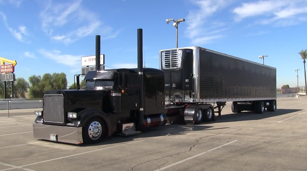 Night Rider Peterbilt 379: The Ultimate Black Knight of the Roadways - Driver First